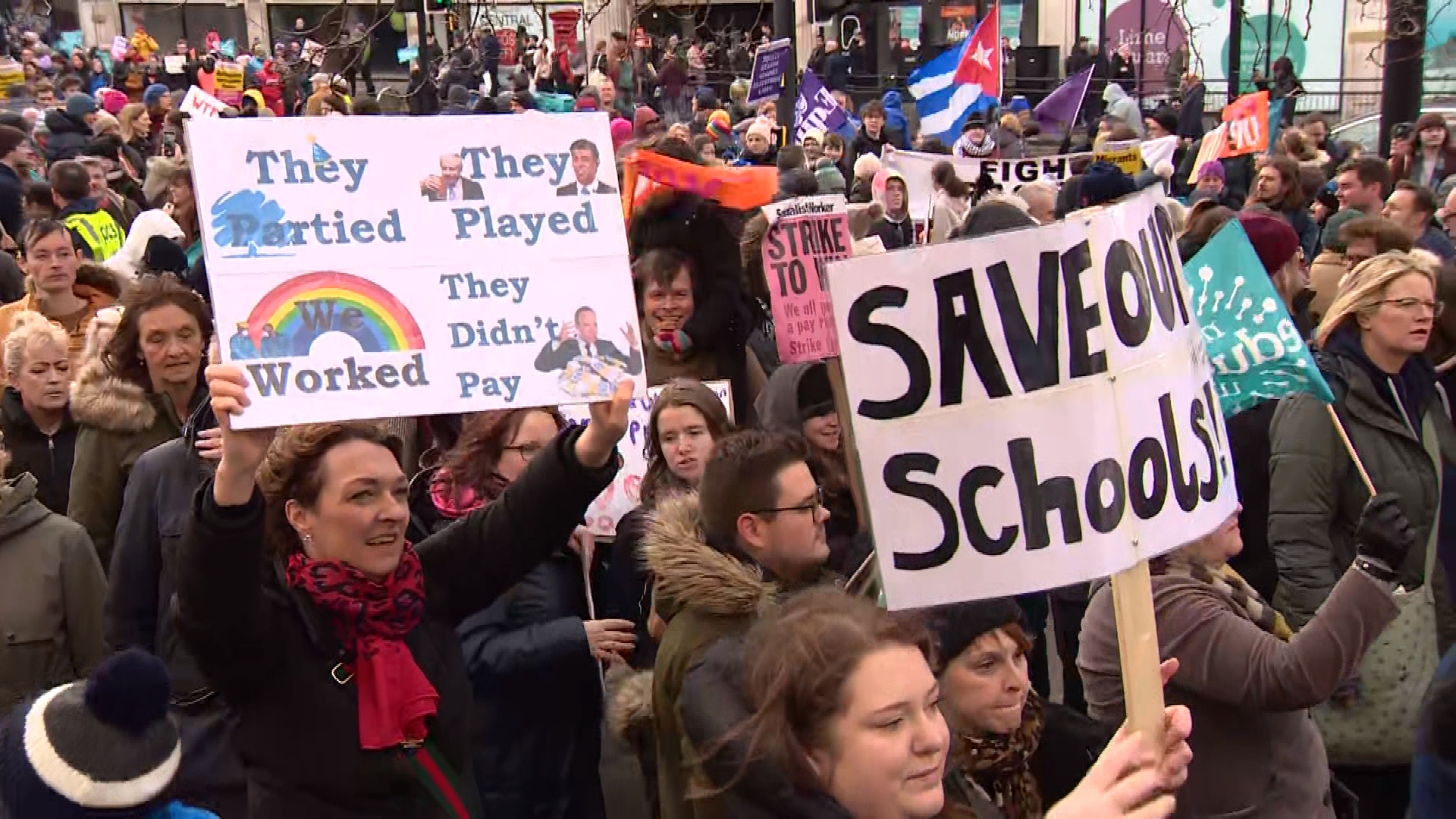 Hundreds march through Liverpool as teachers walk out in biggest strike ...