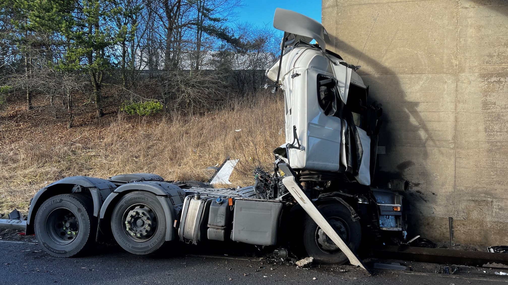 Driver injured after truck smashes into concrete bridge near Durham ...