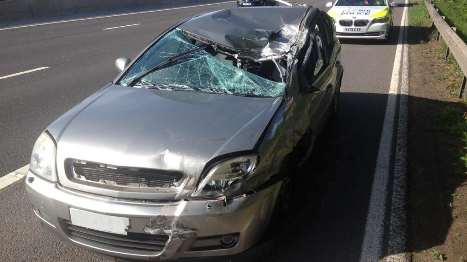 Motorist keeps driving 40 miles after lorry crash squashed car almost ...