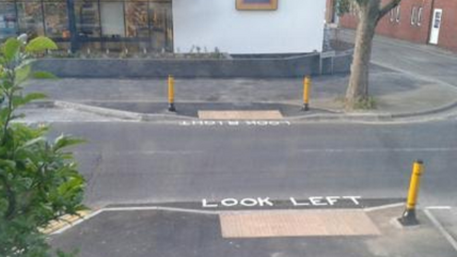 That's not 'right' - workmen paint wrong road markings on crossing ...