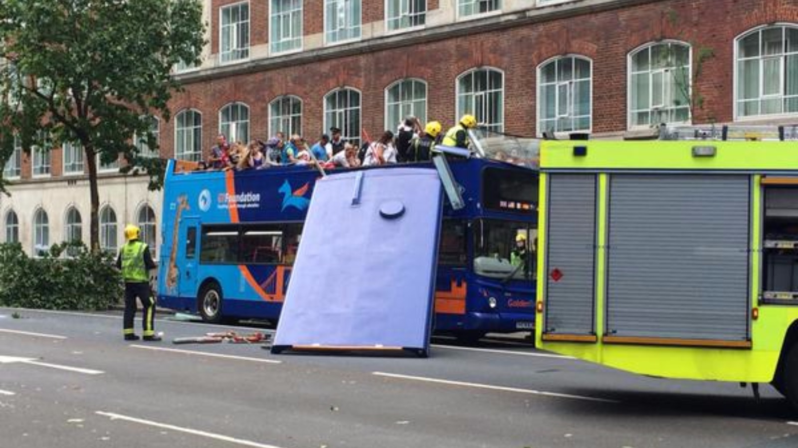 Roof sliced off bus packed with tourists in central London | ITV News ...
