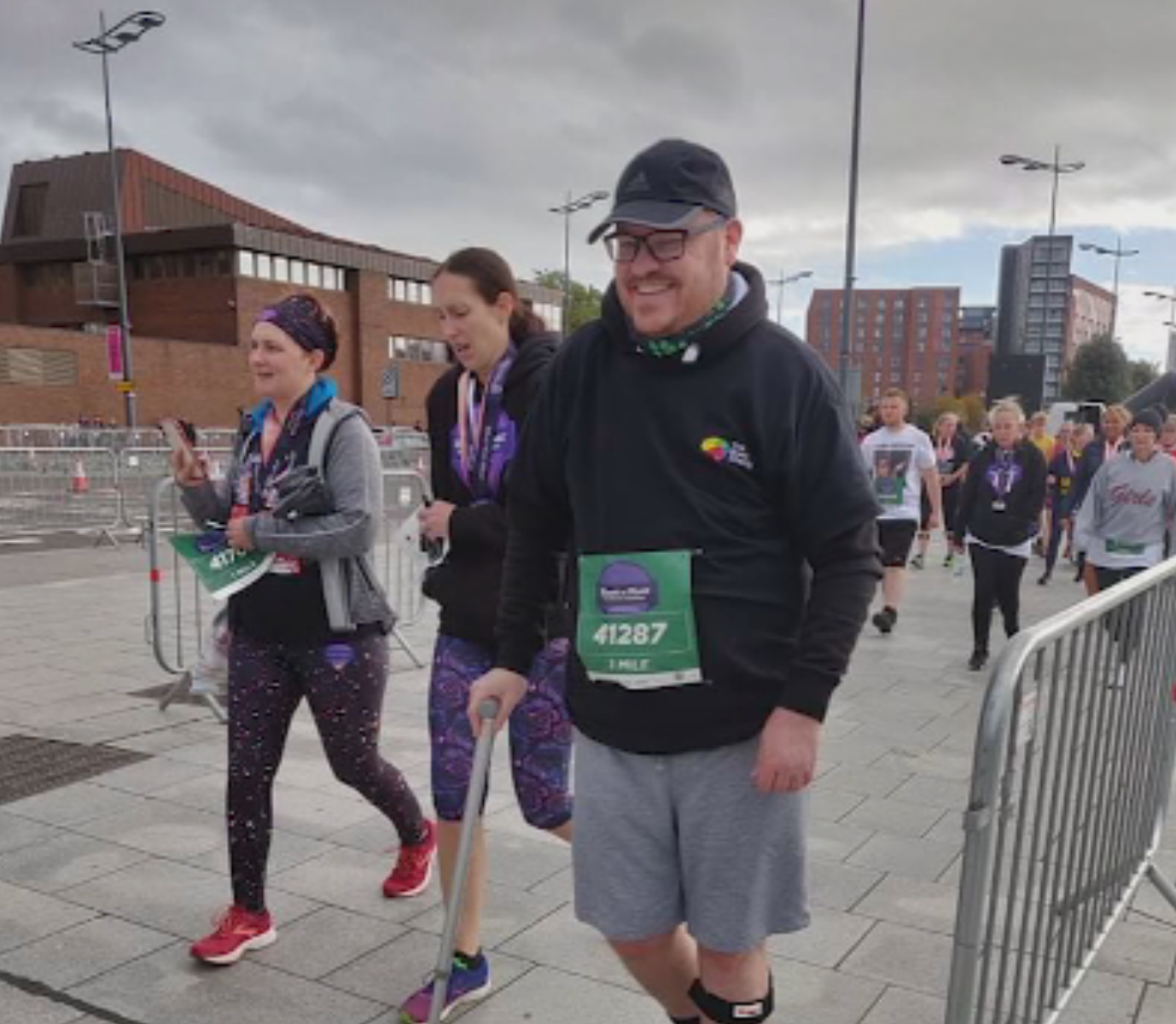 After paralysis father of two defies the odds to walk a mile for ...