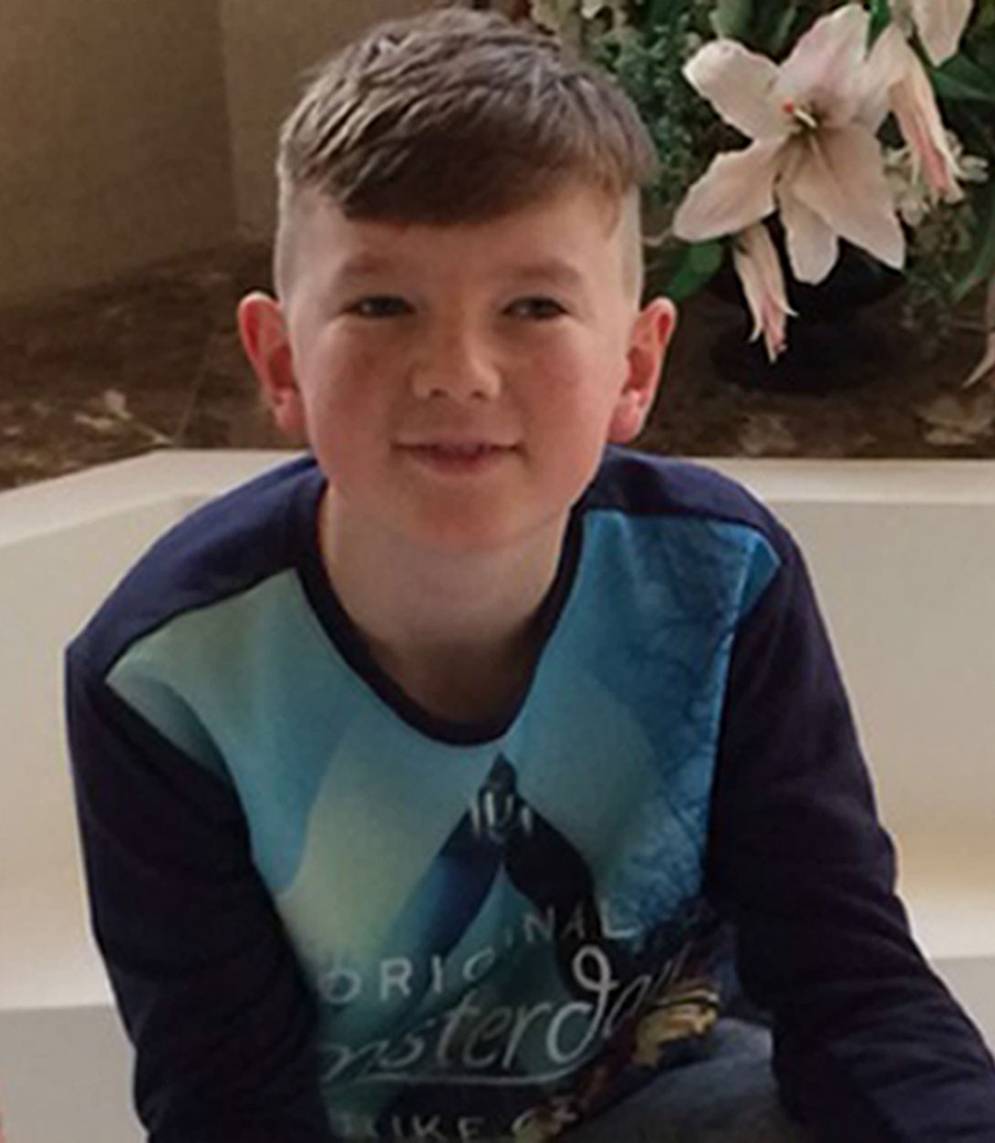 Missing Oldham boy Alex Batty spends first night back in UK after ...