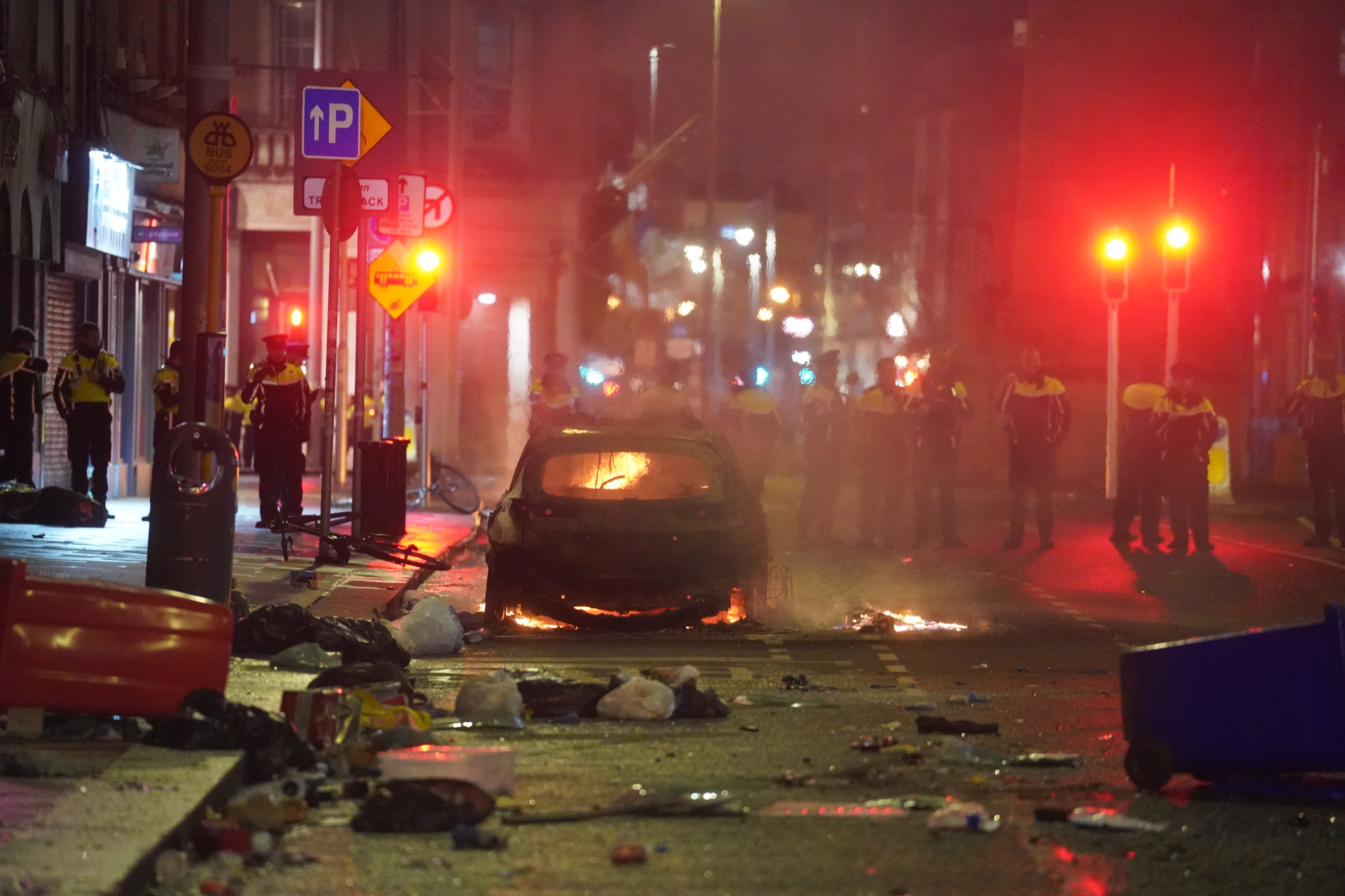 Police condemn ‘gratuitous thuggery’ as rioting breaks out after knife ...