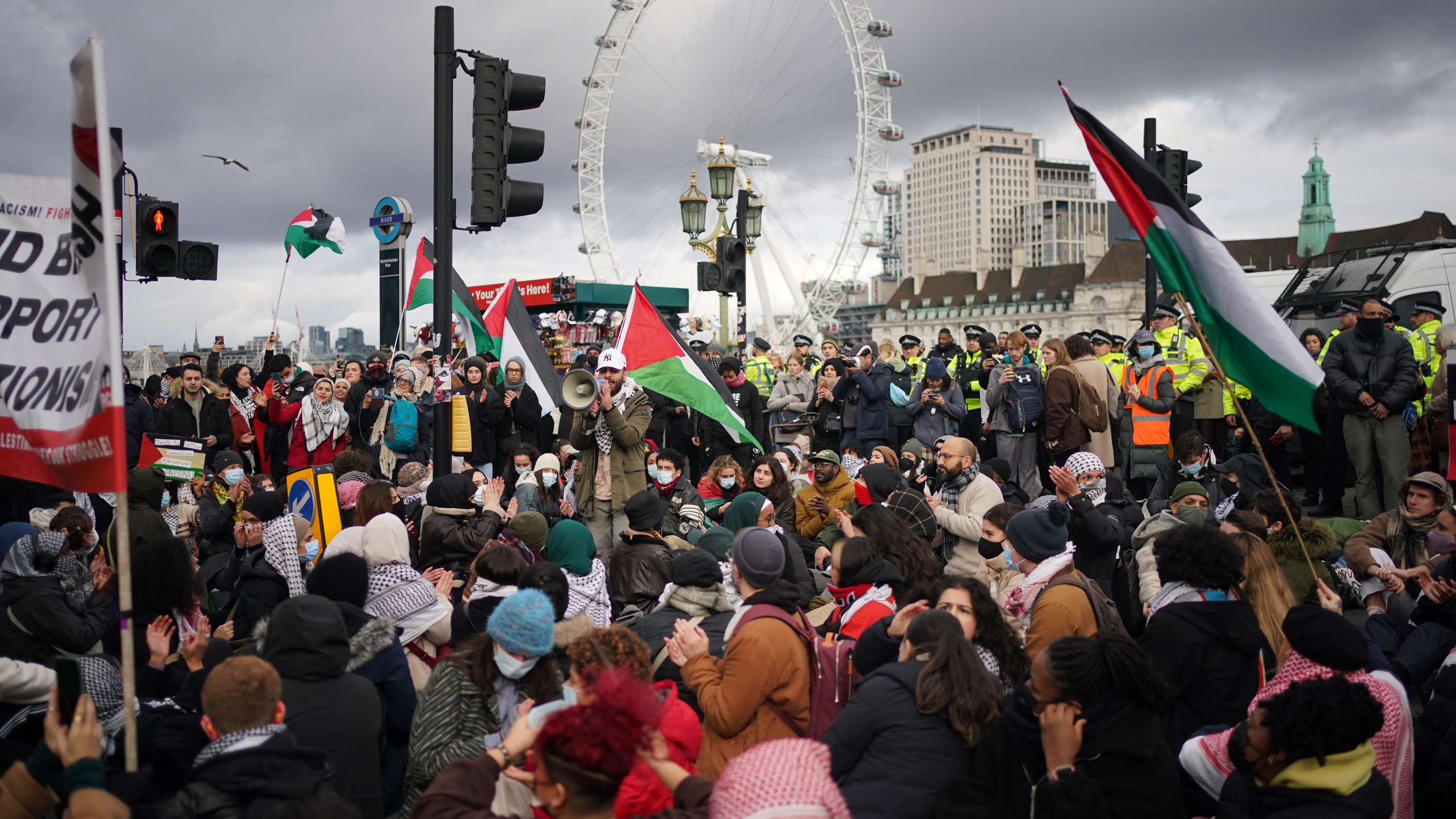 Hundreds of Pro-Palestine protesters stage sit-in blocking Westminster ...