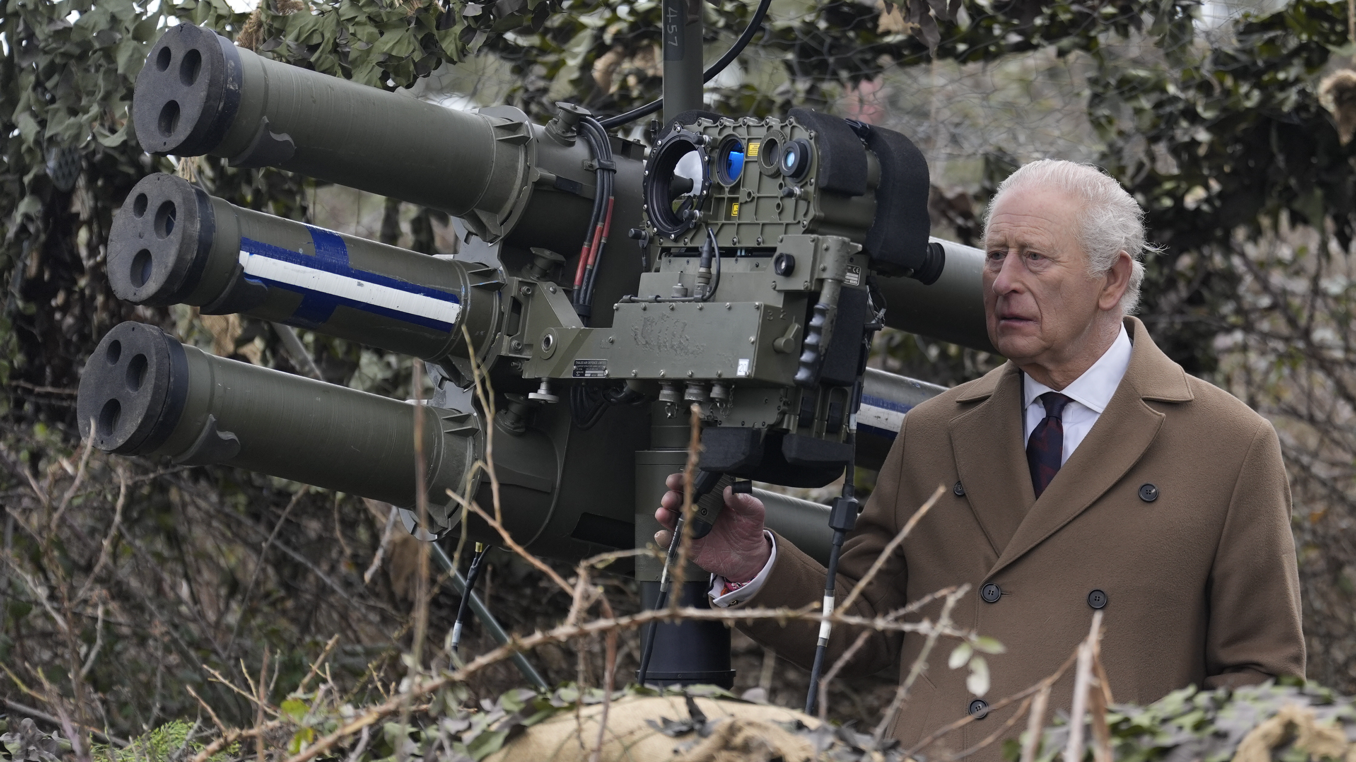King takes part in air defence exercise and meets military families at ...