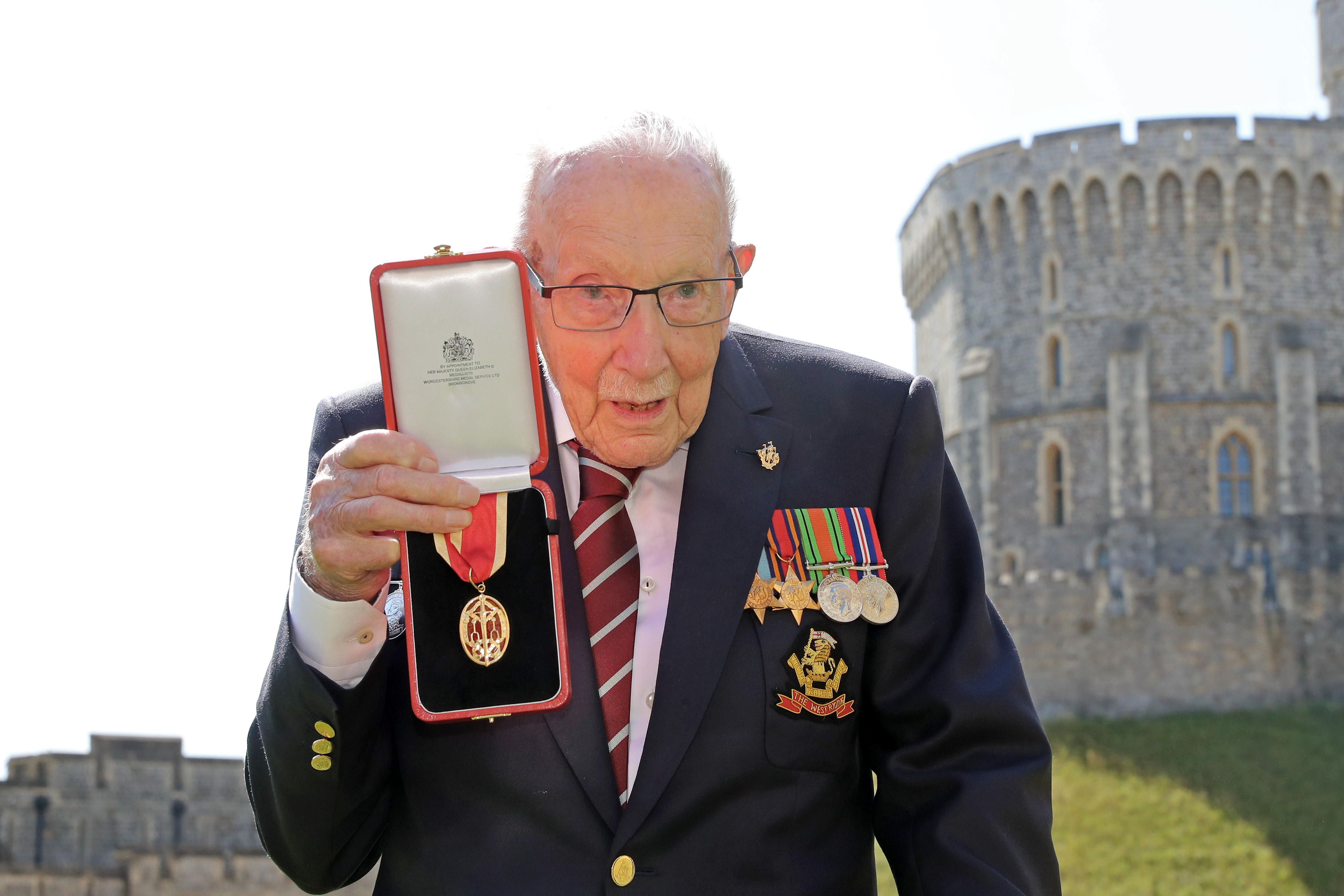 ‘Absolutely magnificent day’ as Captain Sir Tom Moore is knighted by ...