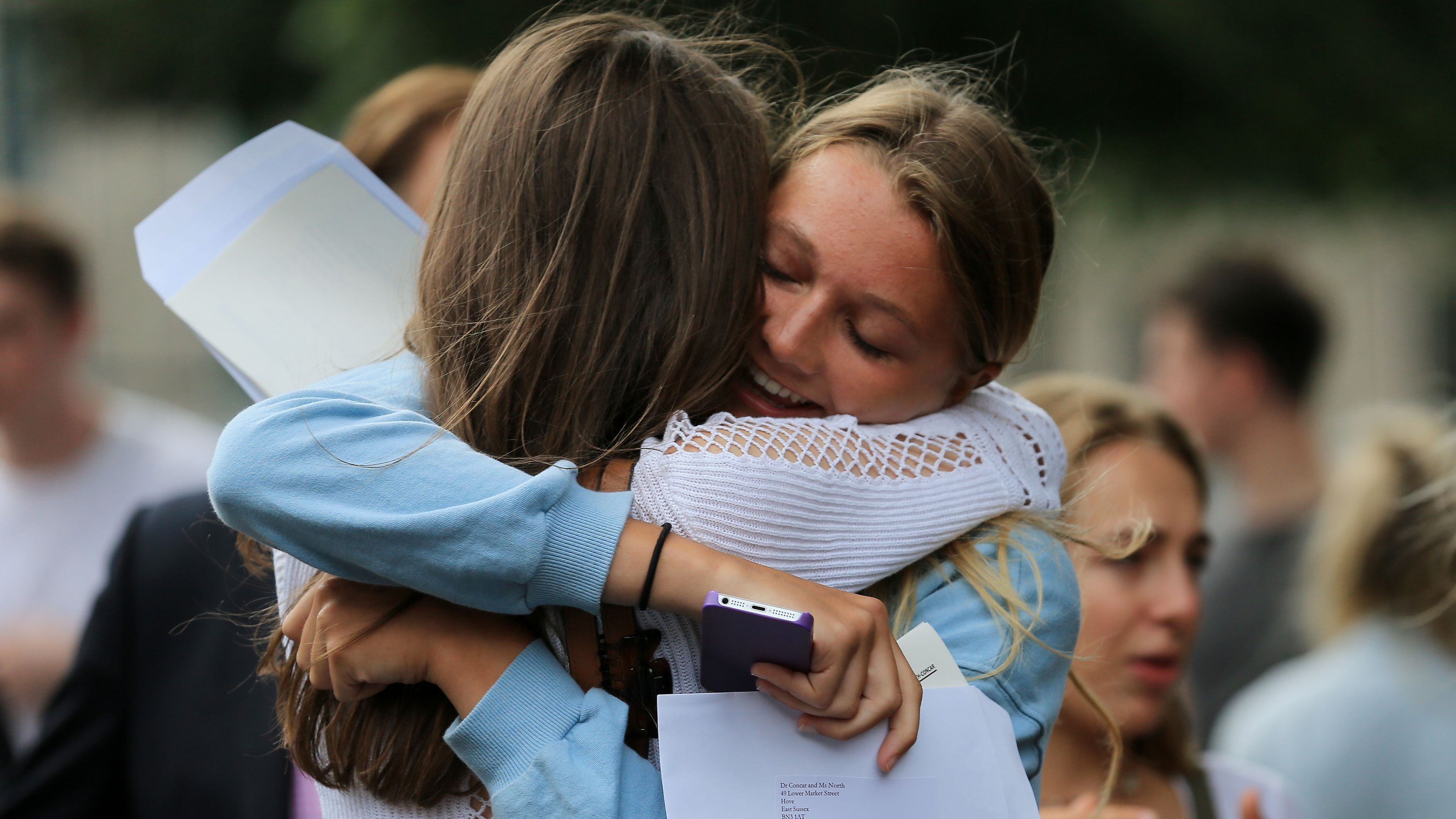 A-level pass rate hits all-time high following grading U-turn | ITV News