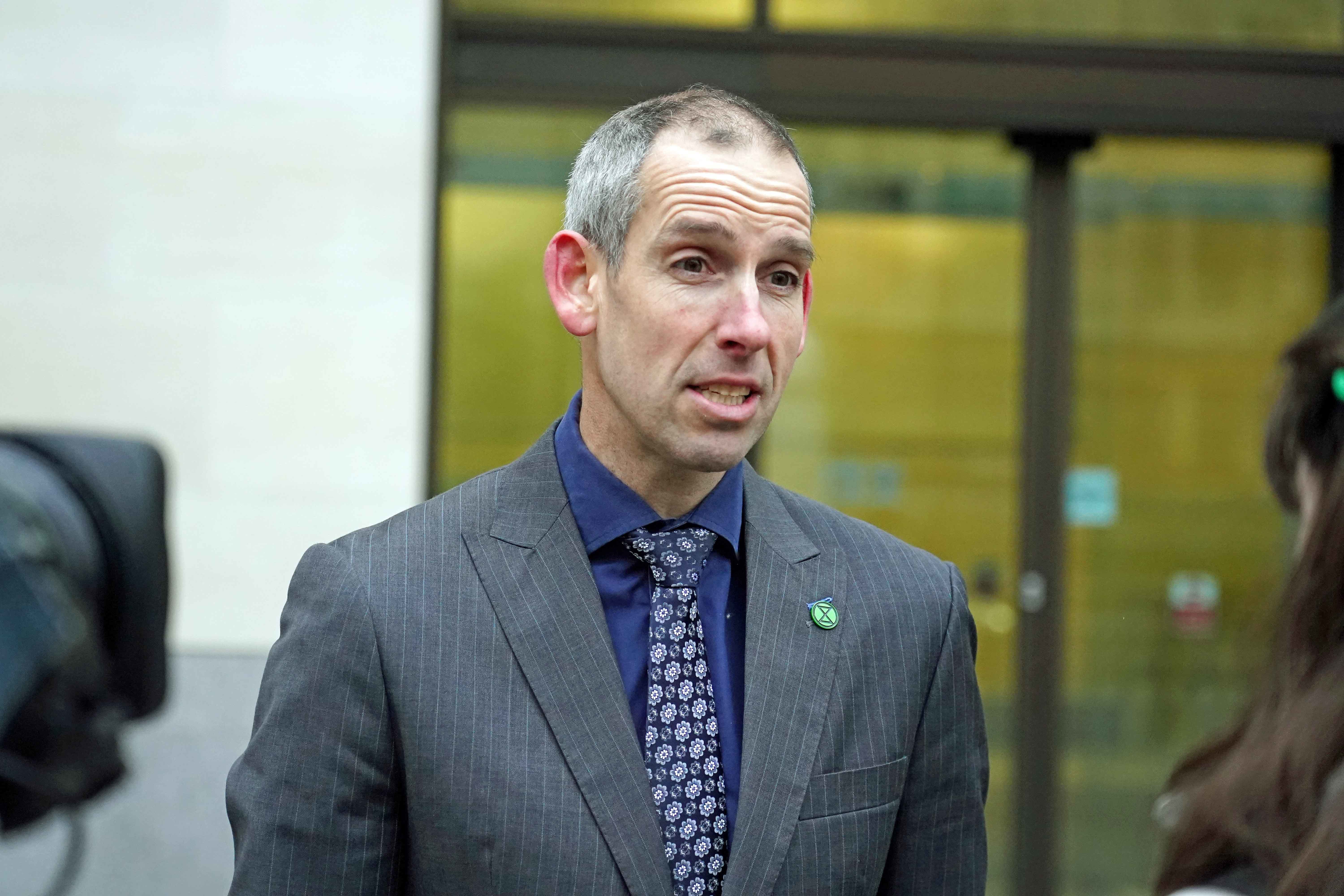 Olympic gold-winning canoeist Etienne Stott and climate protesters ...