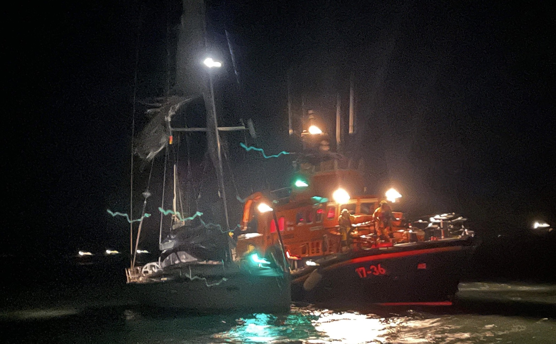 Eight people airlifted to safety in 85mph winds from sinking yacht off ...