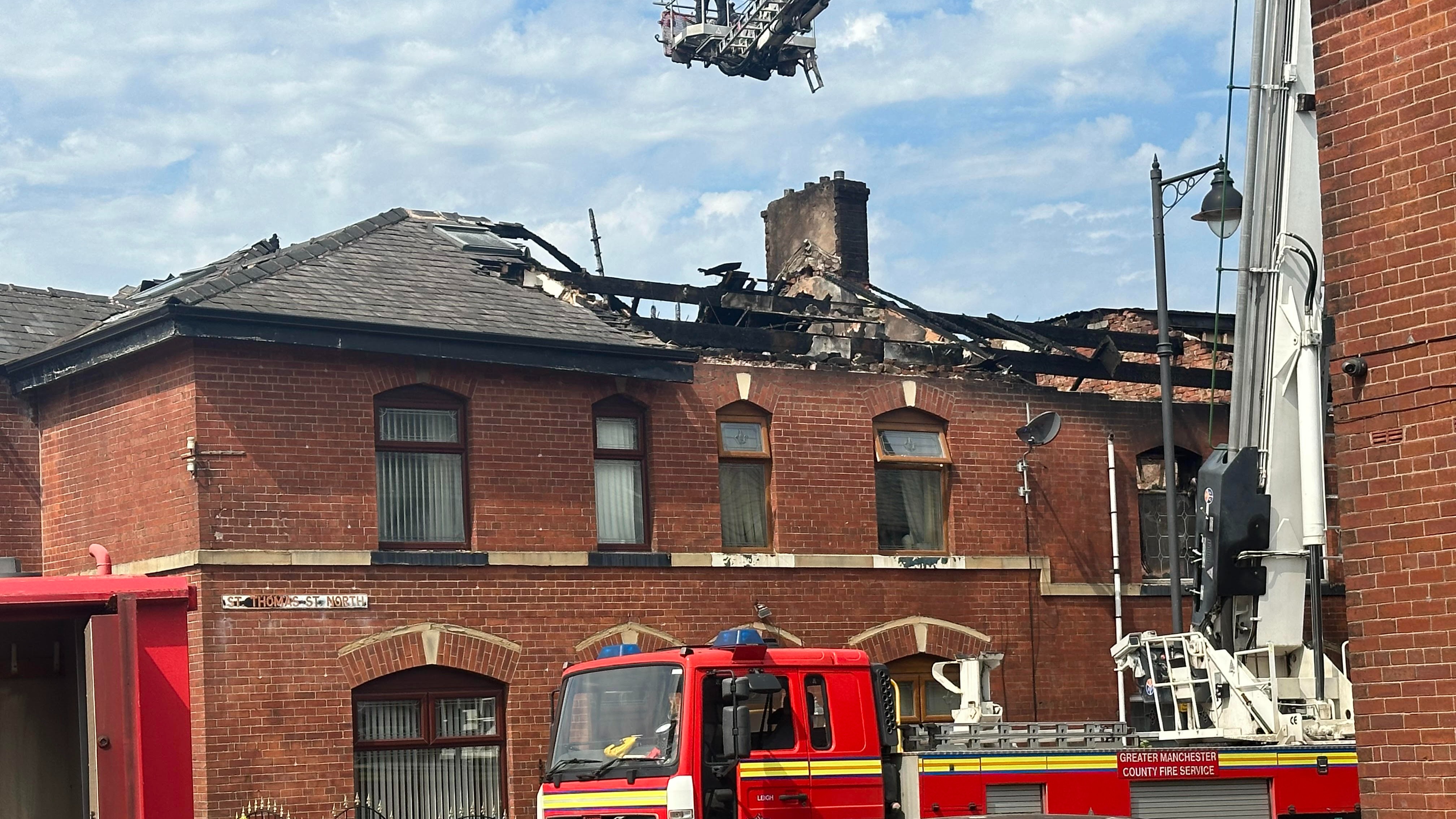 House fire in Oldham leaves woman, 42, dead and 15-year-old girl in ...