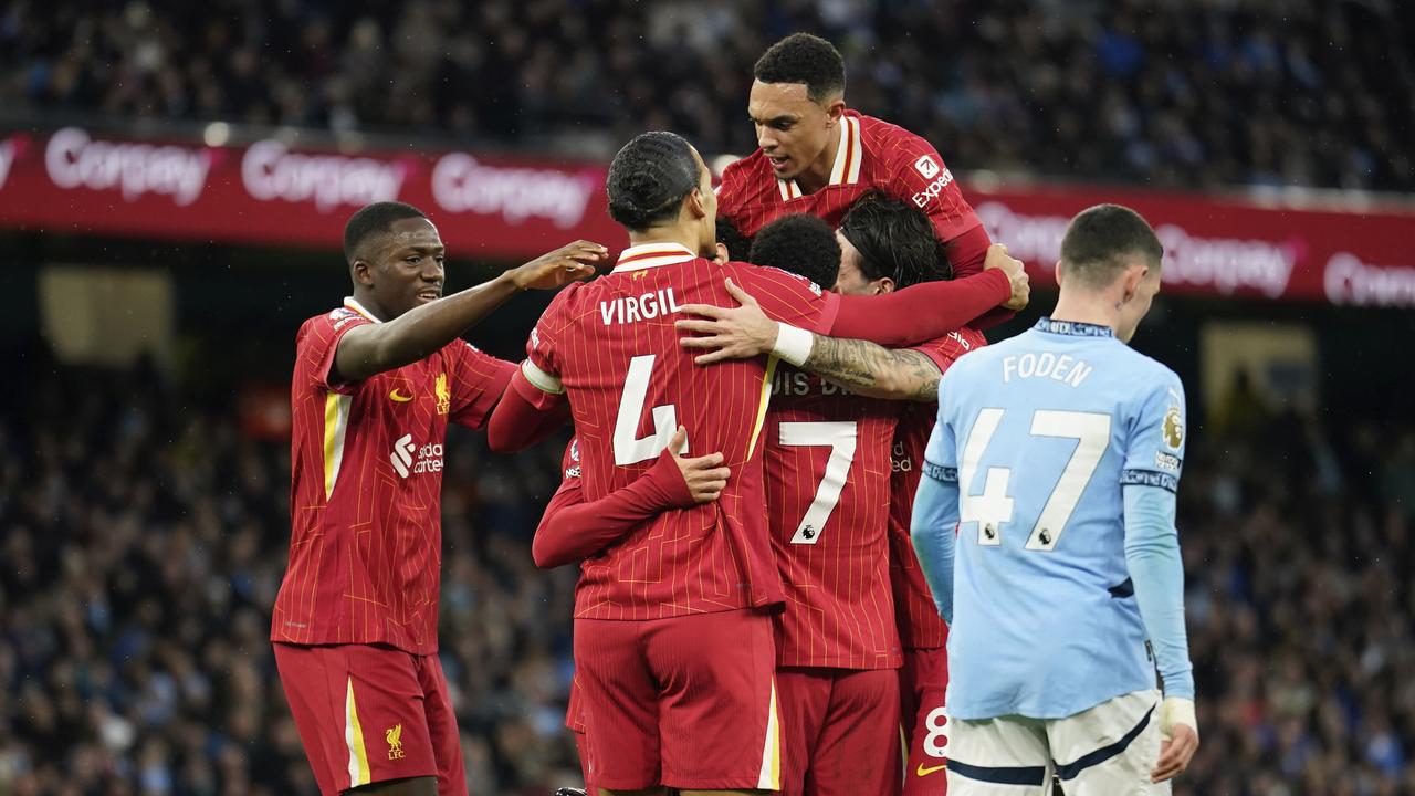 Liverpool pull clear atop Premier League after caning Manchester City