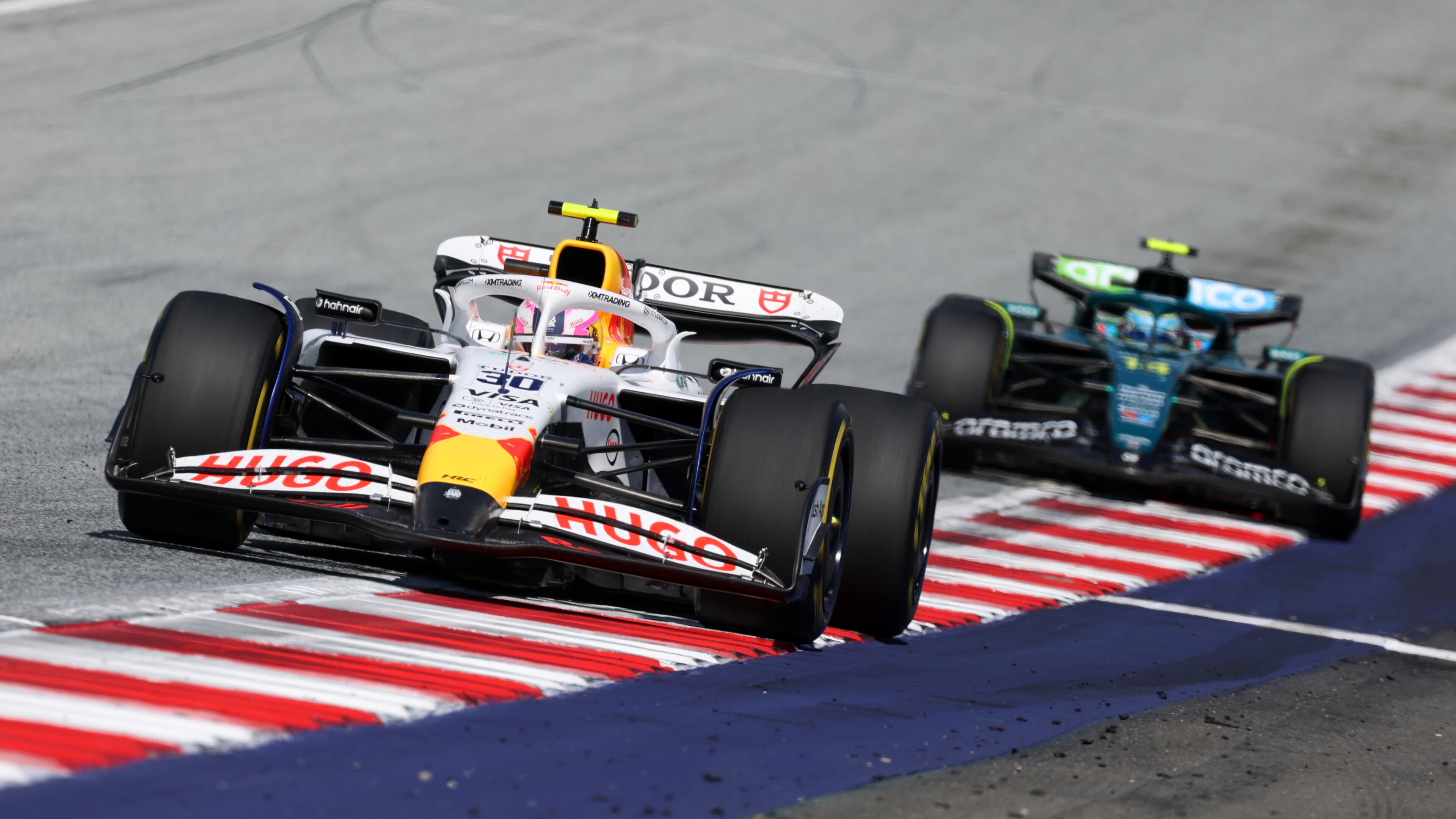Lawson holds off Alonso challenge for F1 career-best finish at Austrian ...