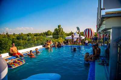 Daytime Rooftop Pool Party In Budapest | Pissup Stag Dos