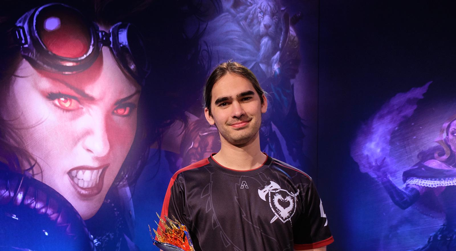 Eli Loveman, Mythic Champion - Article