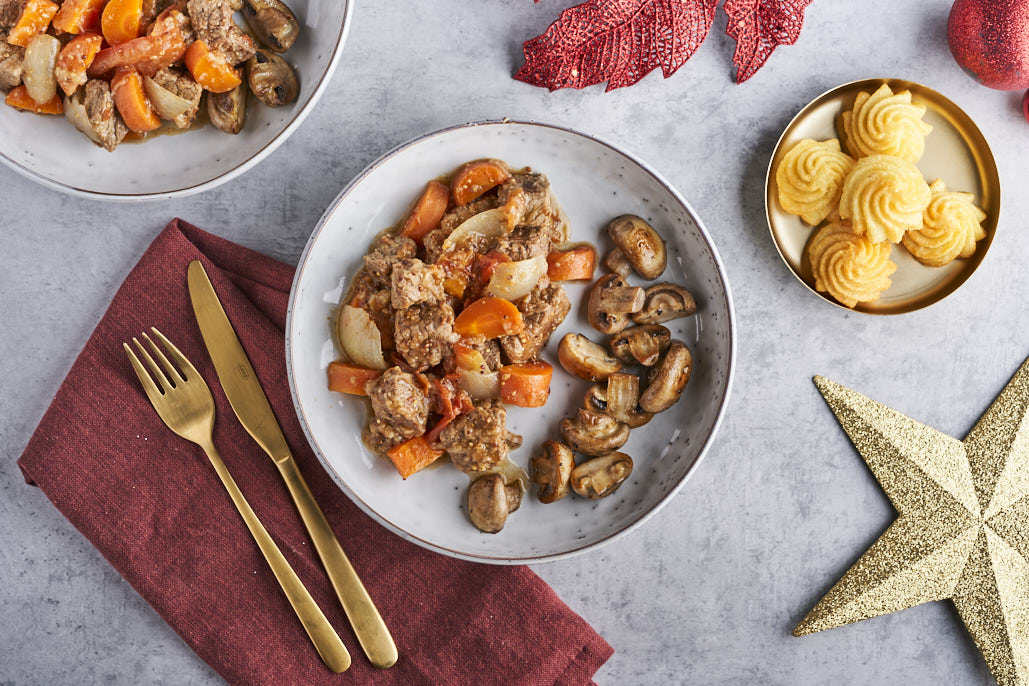 Kruidige runderstoof met pommes duchesses en champignons | Recepten | PLUS
