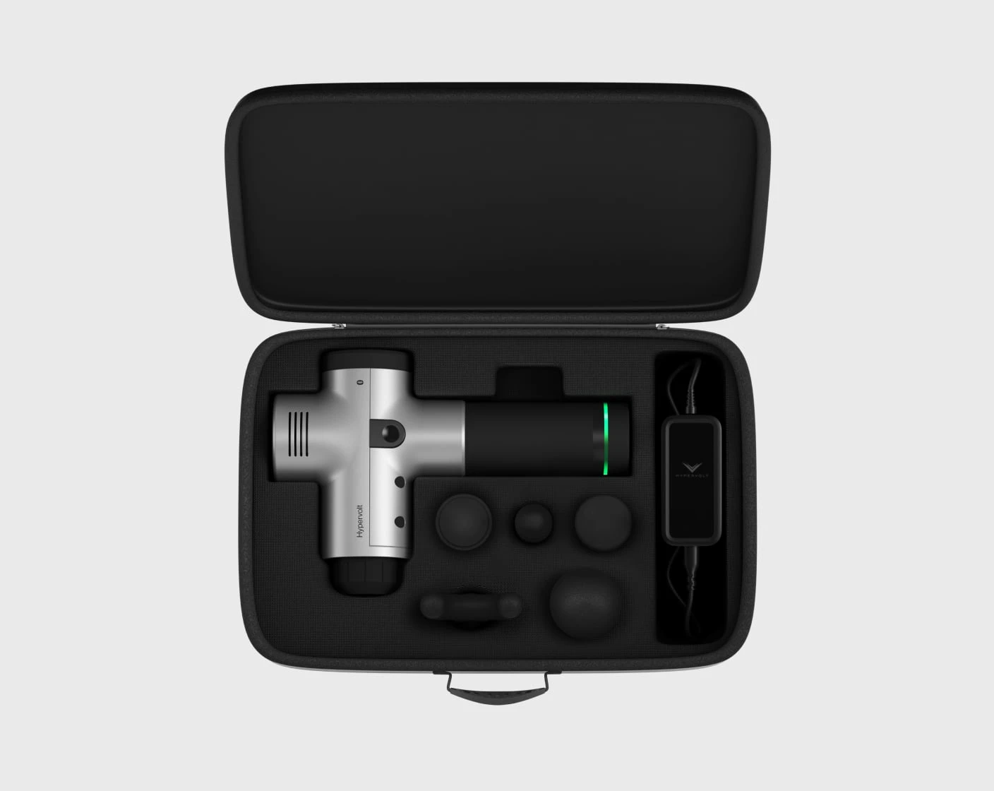 A custom inlay holds the Hypervolt, head attachments and battery ...