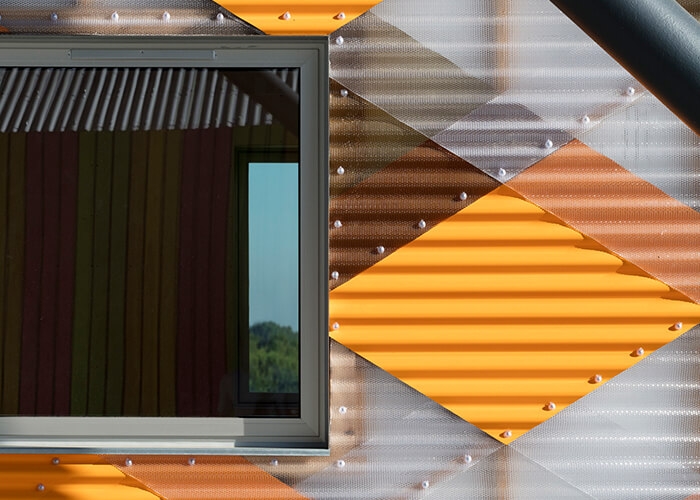 Design turns a gantry into a low-cost “vertical village” for creatives