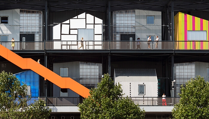 Design turns a gantry into a low-cost “vertical village” for creatives