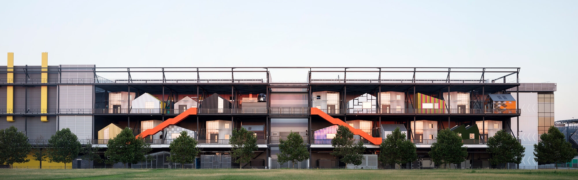 Design turns a gantry into a low-cost “vertical village” for creatives