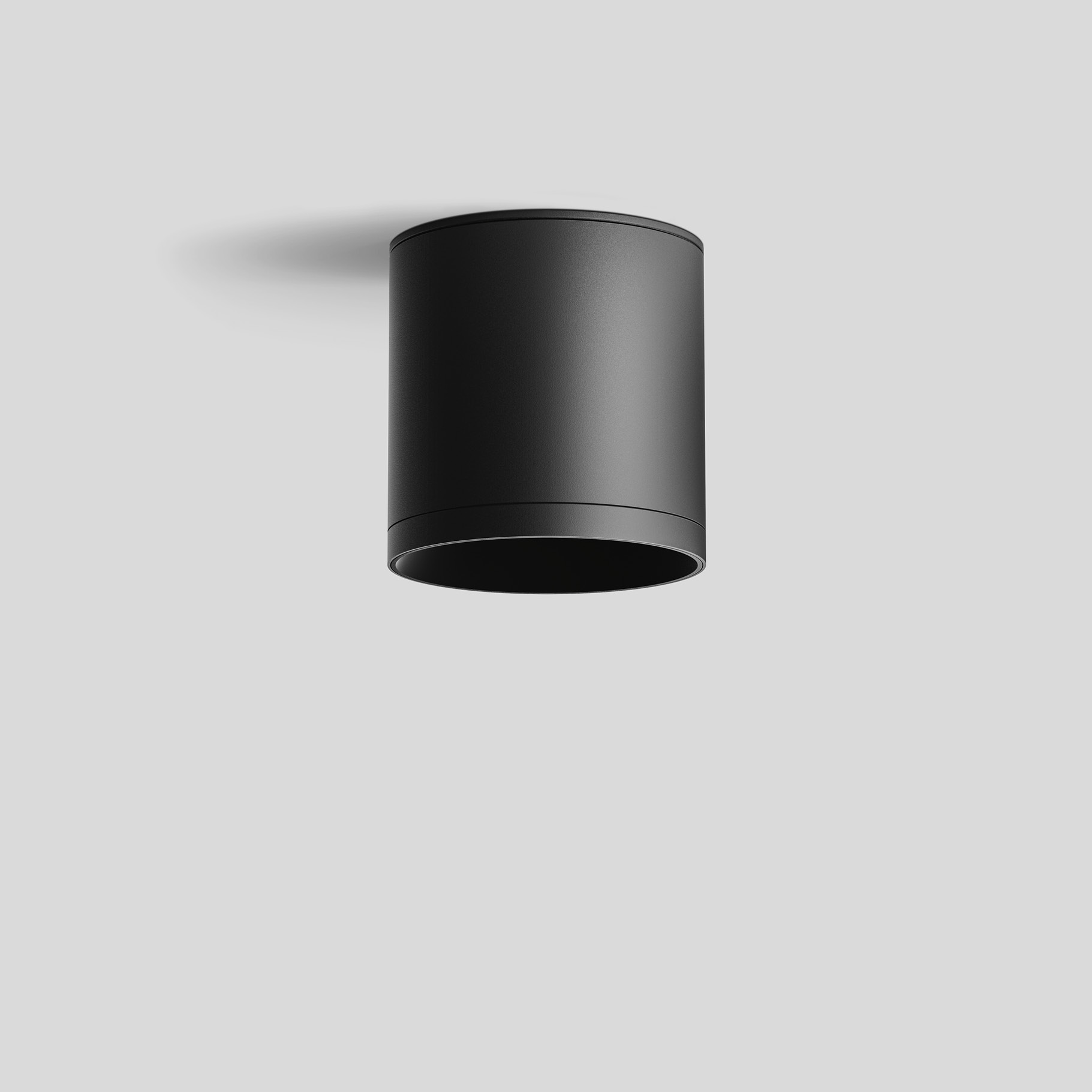 Ceiling-mounted compact downlights with minimal diffuse light ...