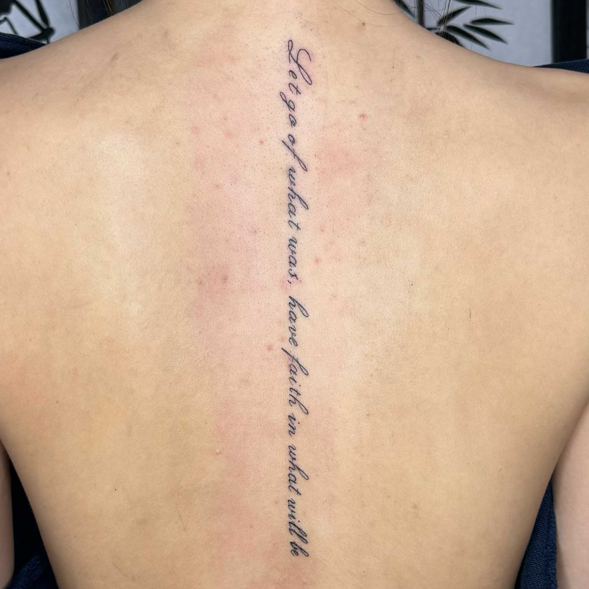 Spine Tattoo Writing