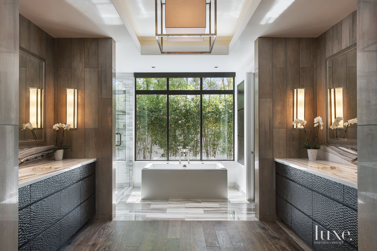 Modern Brown Bathroom with Deep Soaking Tub | Luxe Interiors + Design