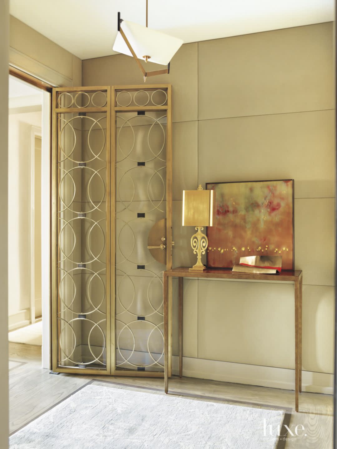 Contemporary Neutral Foyer with Console Table | Luxe Interiors + Design