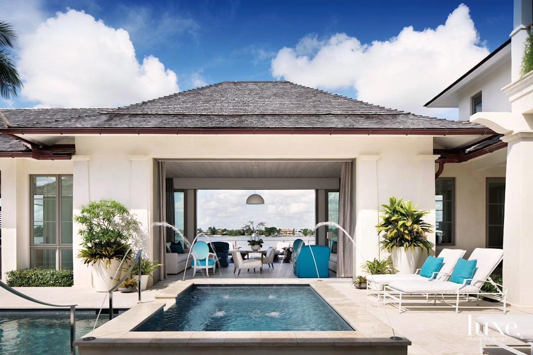 Modern White Courtyard with Hot Tub | Luxe Interiors + Design