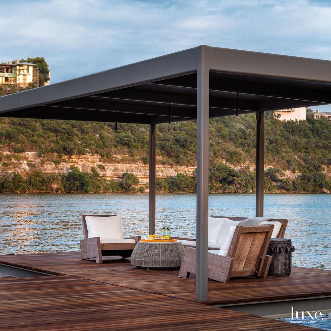 Modern Neutral Swim Dock with Metal Awning | LUXE Interiors + Design