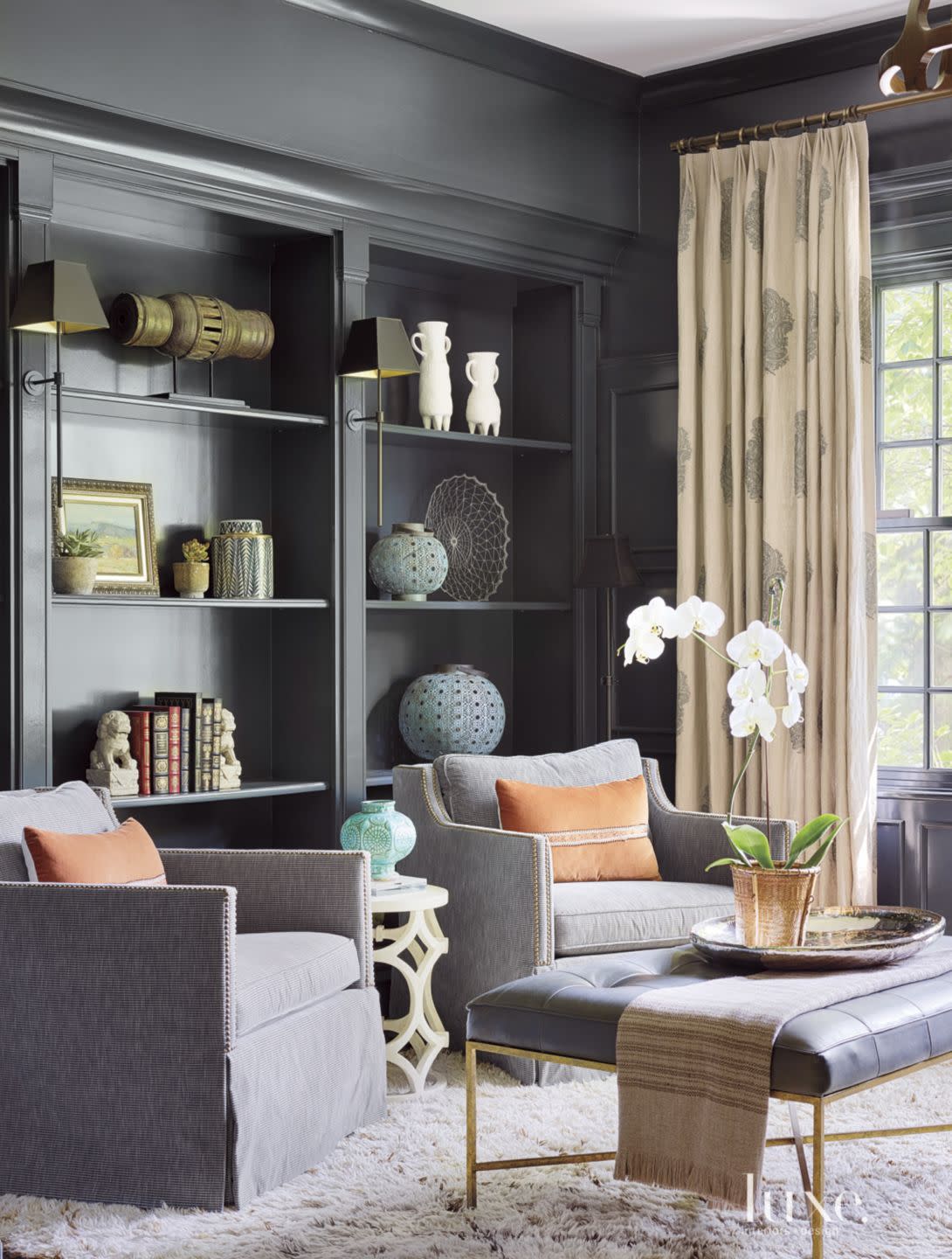 Contemporary Black Library Seating Area | Luxe Interiors + Design