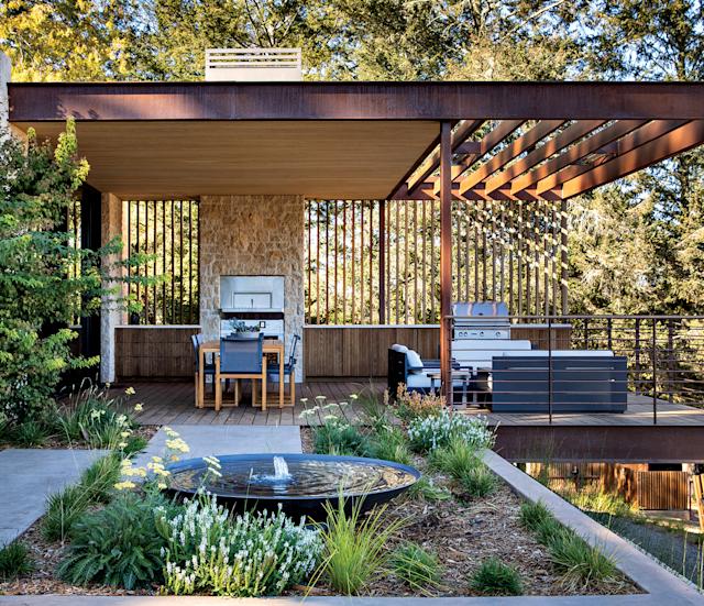 The Design Of This Open-Air Pool House Exudes Rustic Refinement | LUXE Interiors + Design