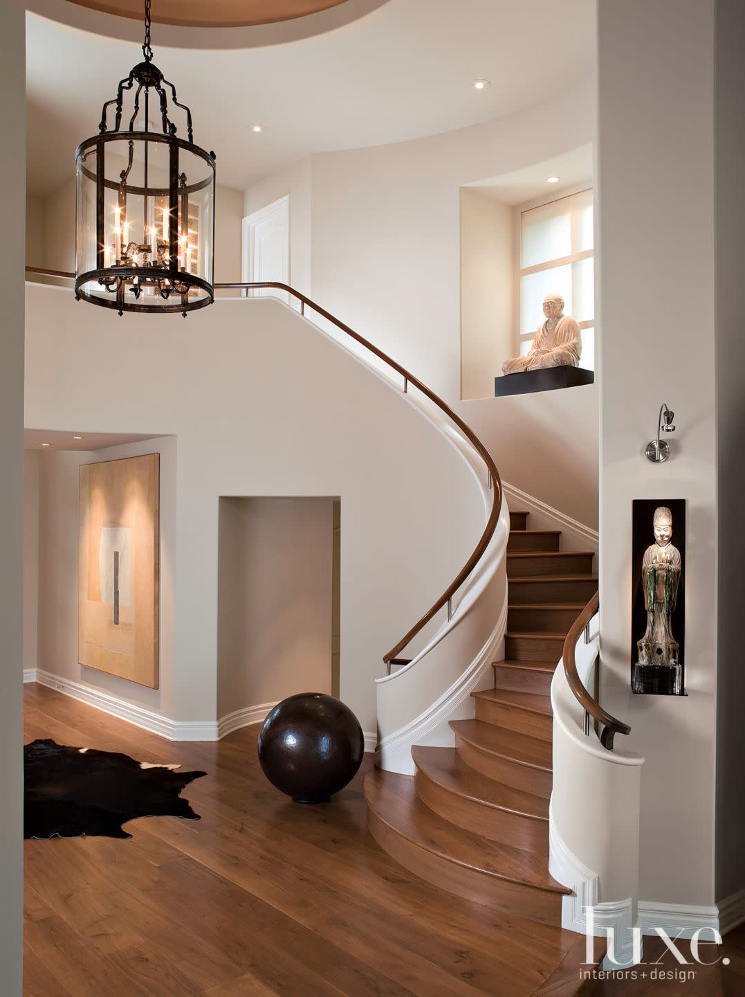 Contemporary Curved Wooden Staircase | LUXE Interiors + Design