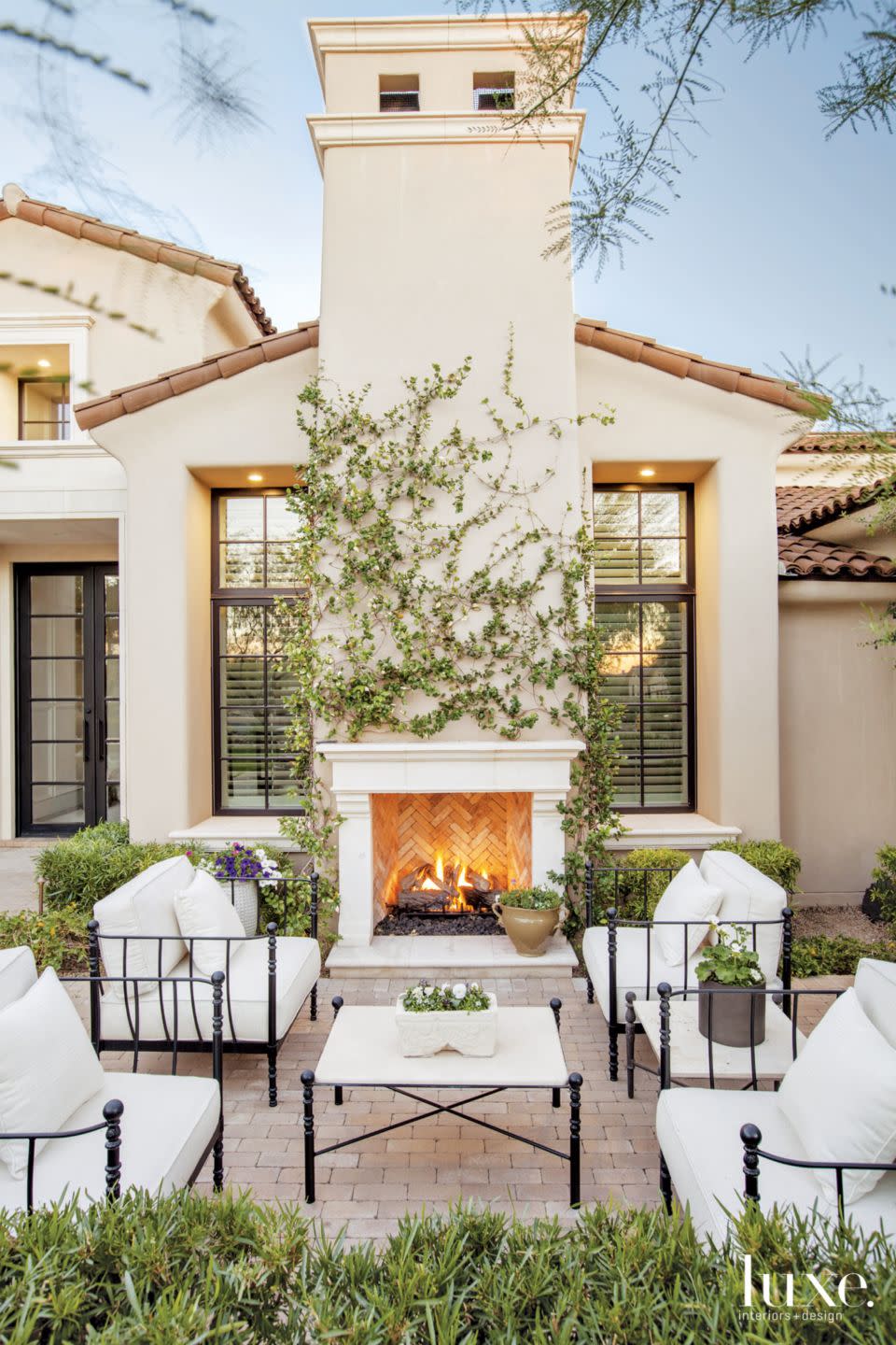 Mediterranean Cream Exterior with Outdoor Seating Area | Luxe Interiors ...