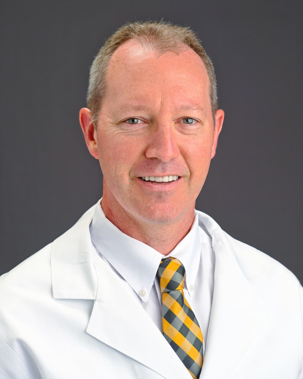 Theodore Choma, M.D.