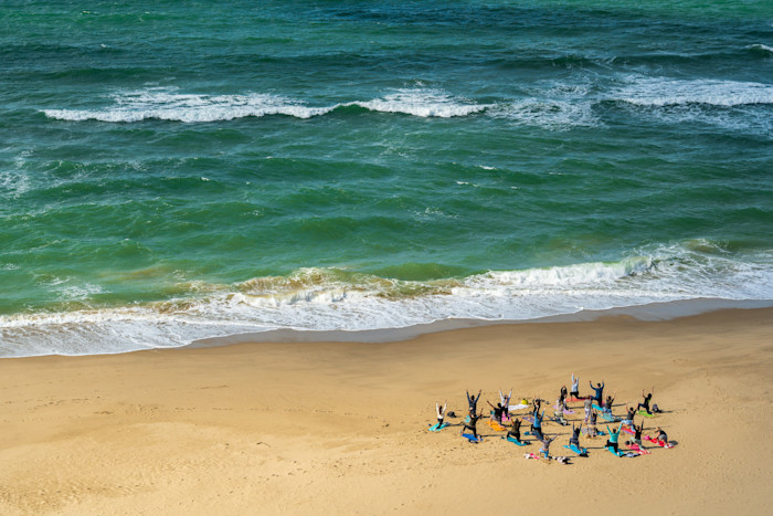 Yoga on the Beach in San Juan | Dreamers Welcome